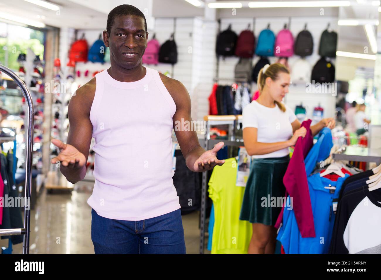 Male shop assistant Stock Photo - Alamy