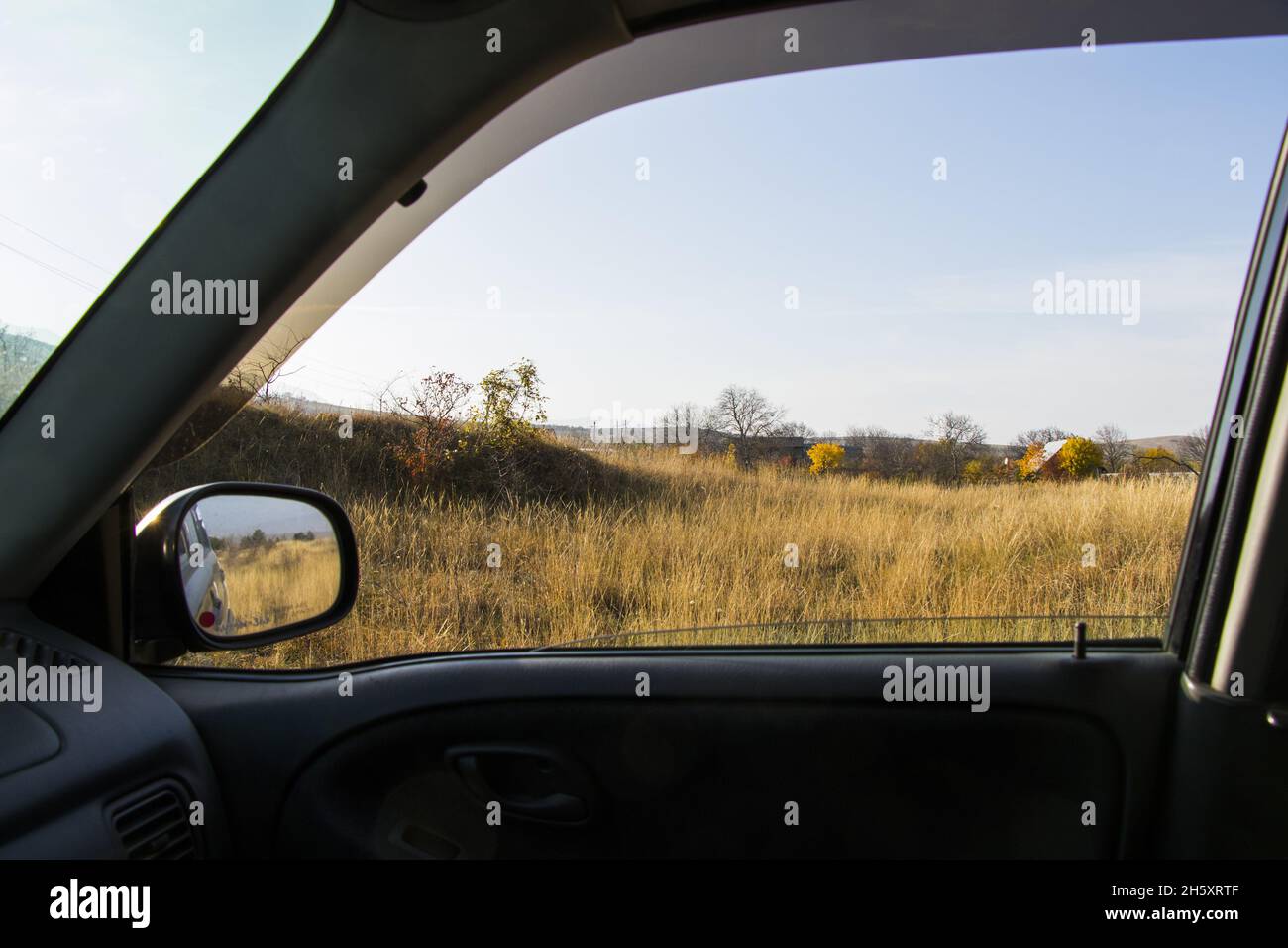 Car mirror and highway view, black car and nature landscape Stock Photo ...