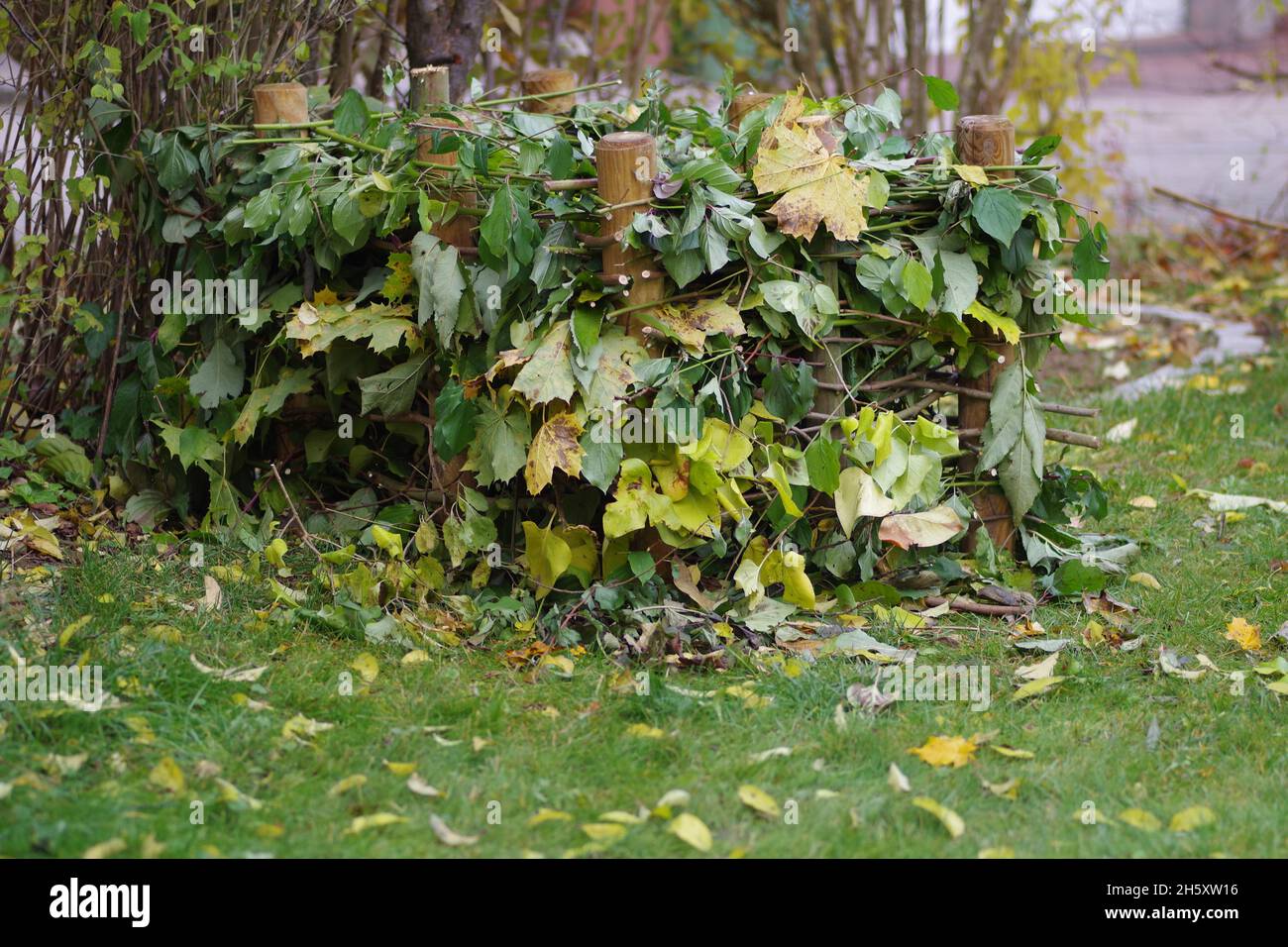 A winter burrow for hedgehogs, birds, mice, insects, etc Stock Photo ...
