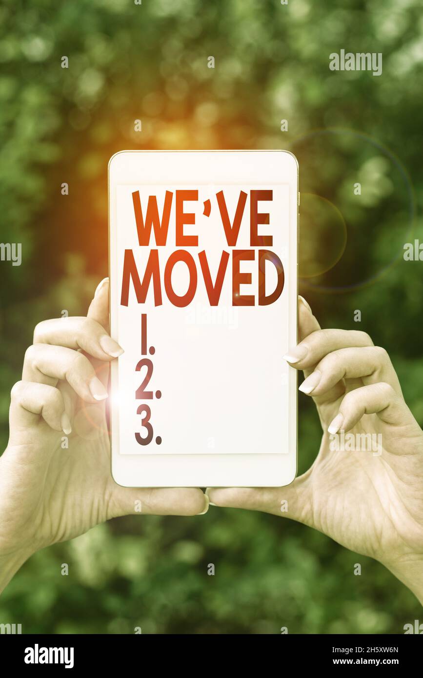 Sign displaying We Ve Moved. Word for having strong feelings sadness or ...