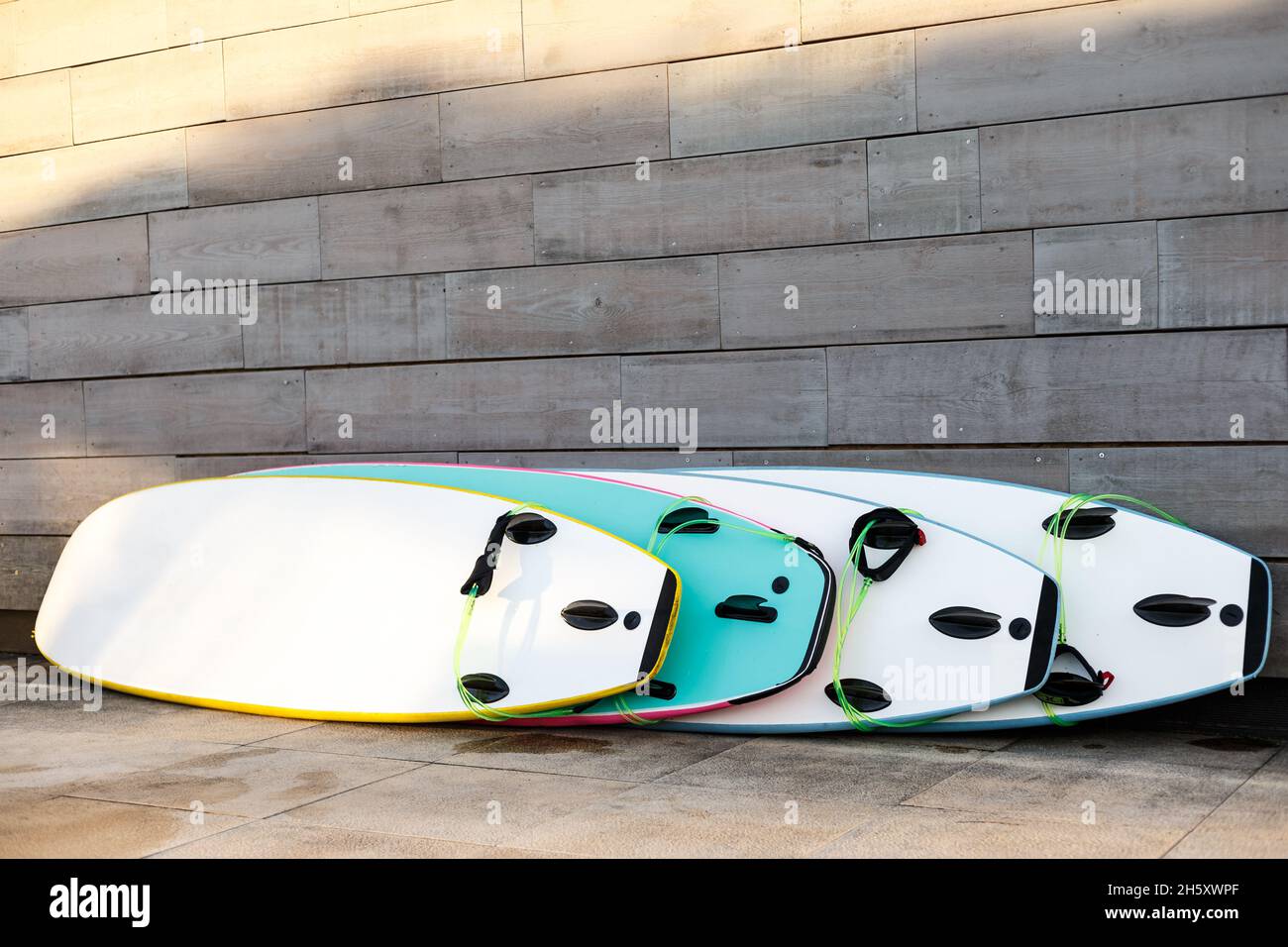 surfboards on the ground at sunset Stock Photo - Alamy