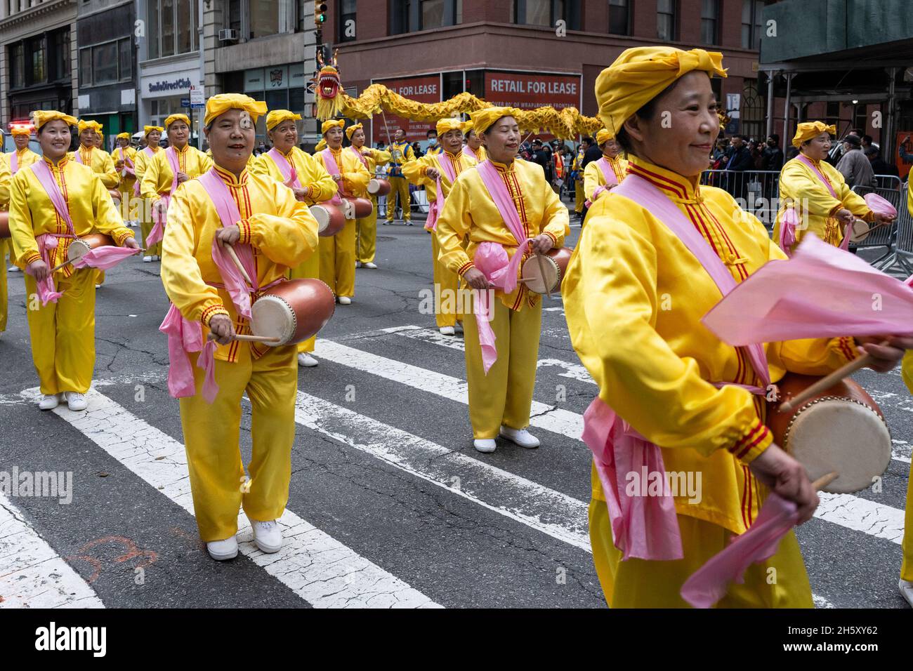 An Asian-American dance group participates in the 102nd Veterans Day ...