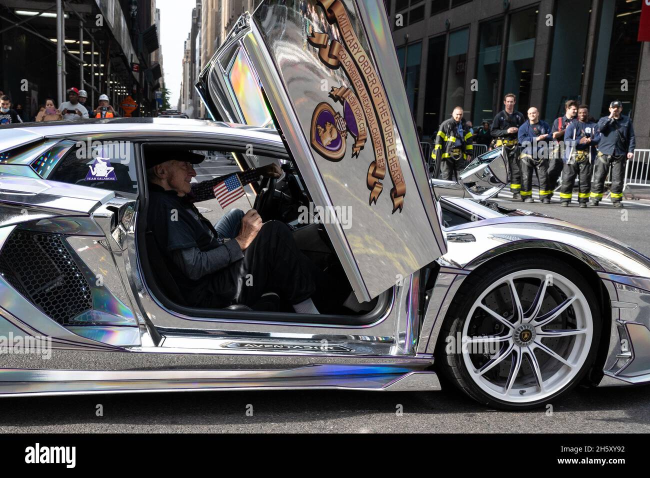 FDNY firefighters looks on as the Military Order of the Purple Heart ...