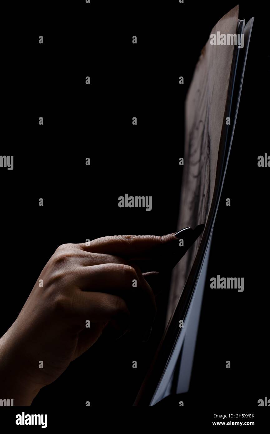 Artist drawing with chalk. Abstract hand painting on paper against ...