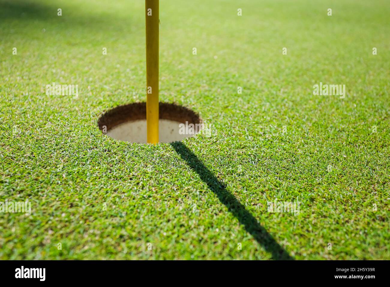 View from above. Golf hole on a green grass Stock Photo - Alamy