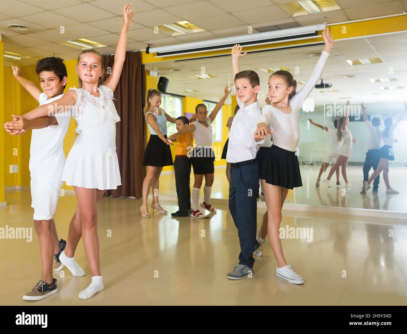 Children dancing pair dance in class Stock Photo - Alamy