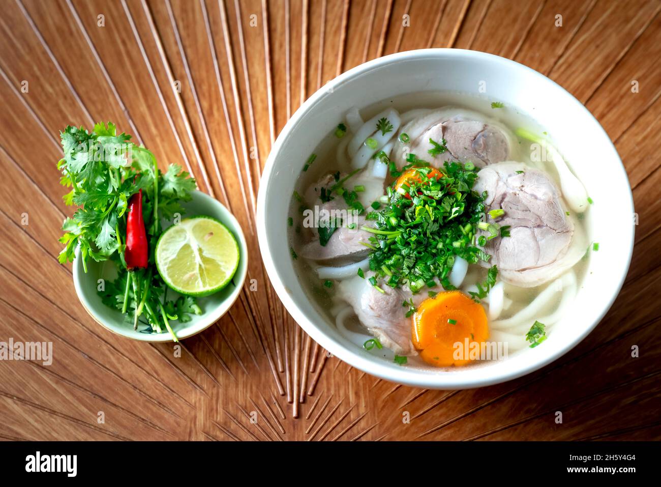 Traditional Vietnamese soup Pho with beef and rice noodles, top view ...