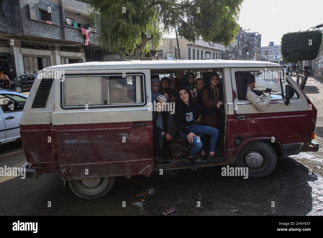 Palestinian school boys seen in a mini van on their way home from ...