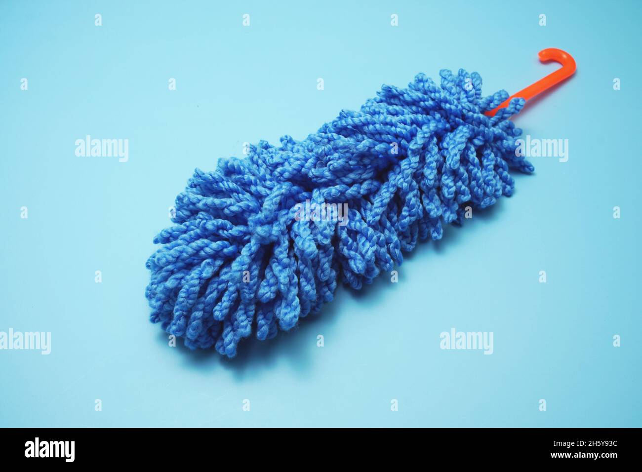 Blue feather duster hi-res stock photography and images - Alamy