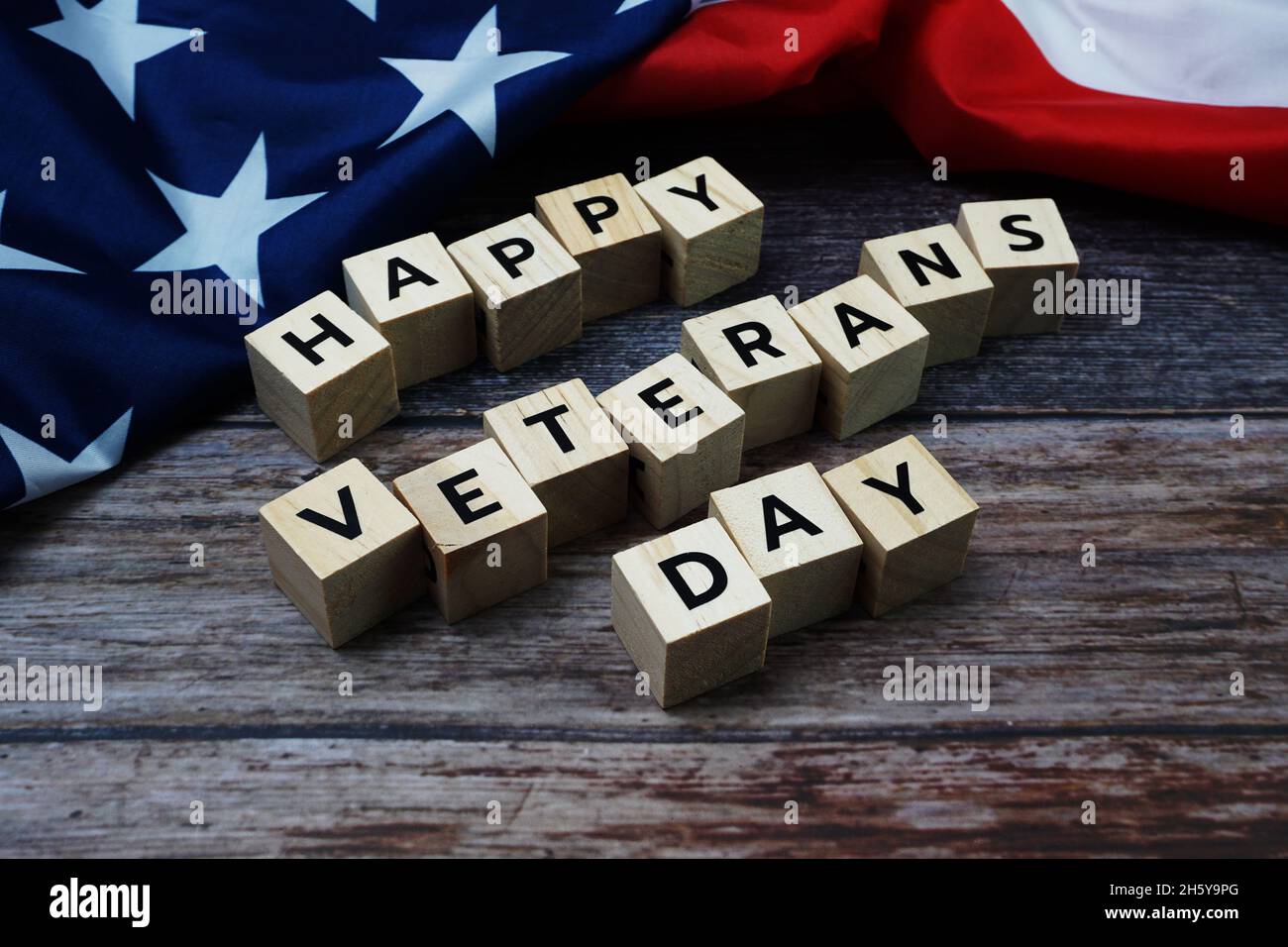 Happy Veterans Day Word alphabet letters with USA flag on wooden ...