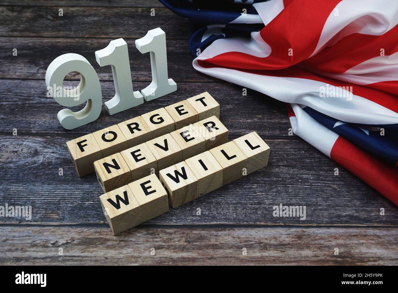 911 We will Never Forget Word alphabet letters on wooden background ...