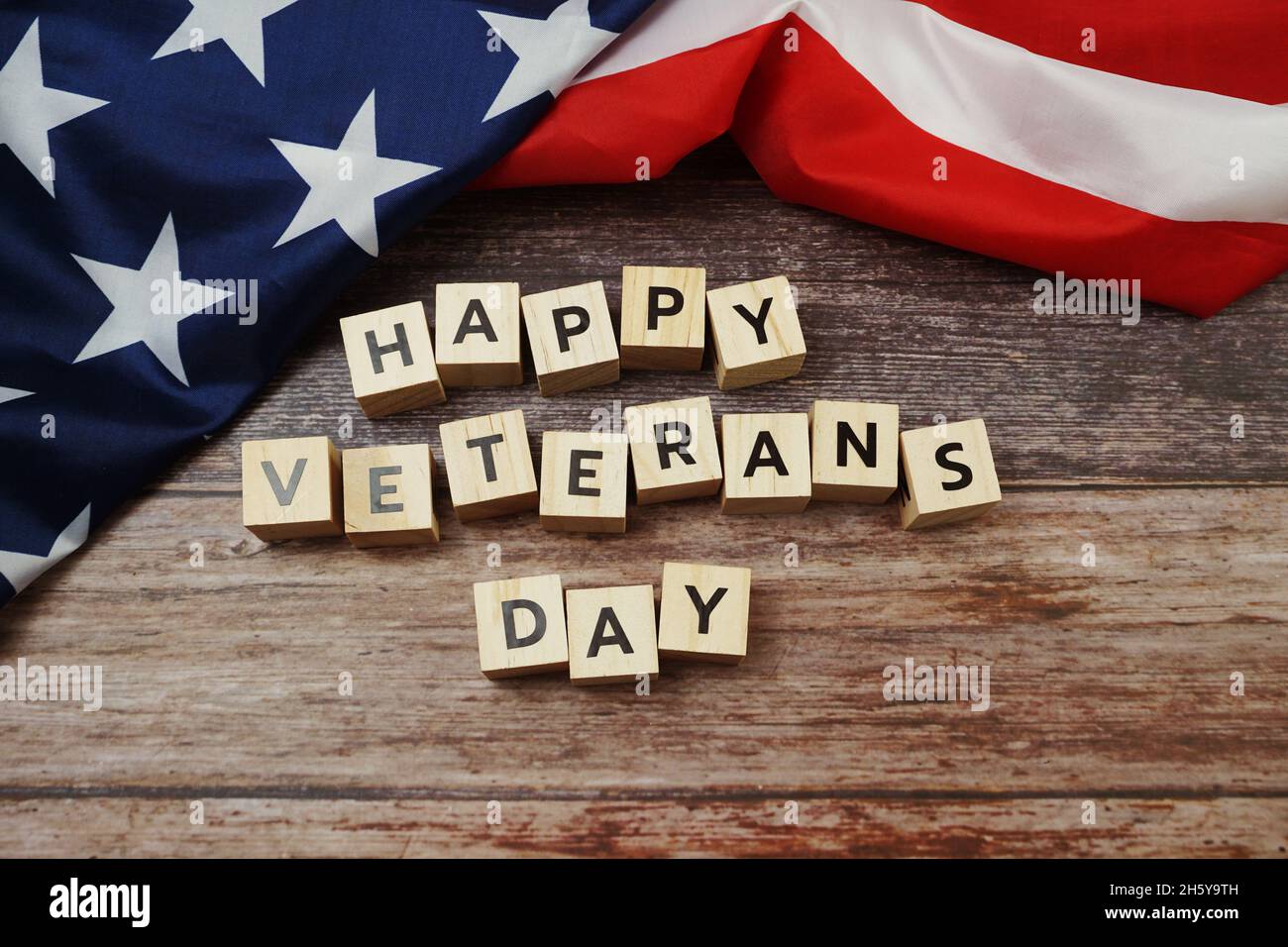 Happy Veterans Day Word alphabet letters with USA flag on wooden ...