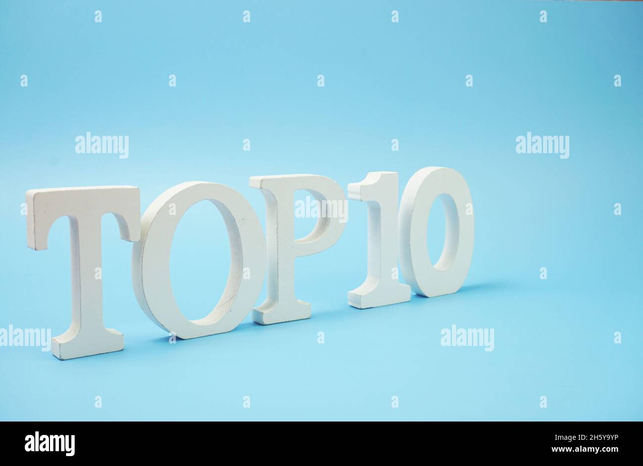 Top 10 word alphabet letters on blue background Stock Photo - Alamy