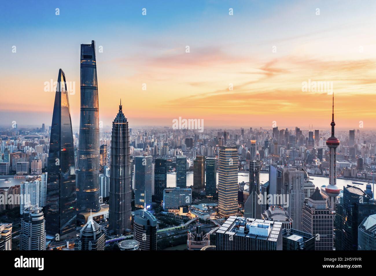 Aerial view of Shanghai skyline and cityscape at sunset,China Stock ...