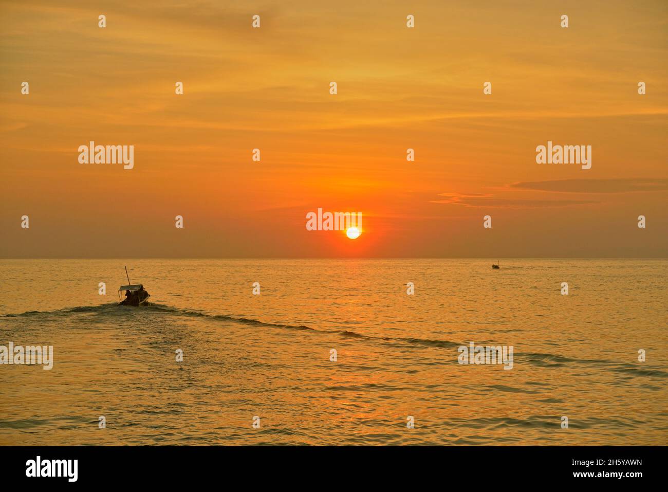 Sunrise and fishing boat, Galapagos Islands National Park, Santa Fe ...