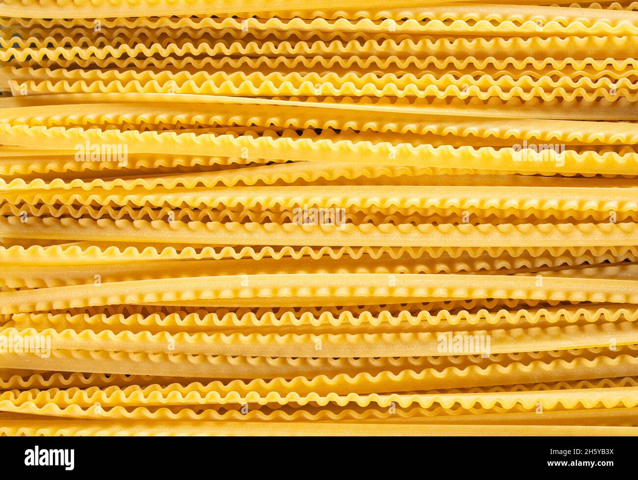 food background from texture of pasta closeup Stock Photo - Alamy