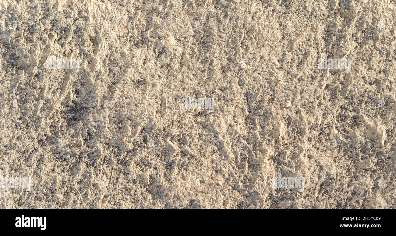 Natural beige stone as a background or texture seamless for design ...