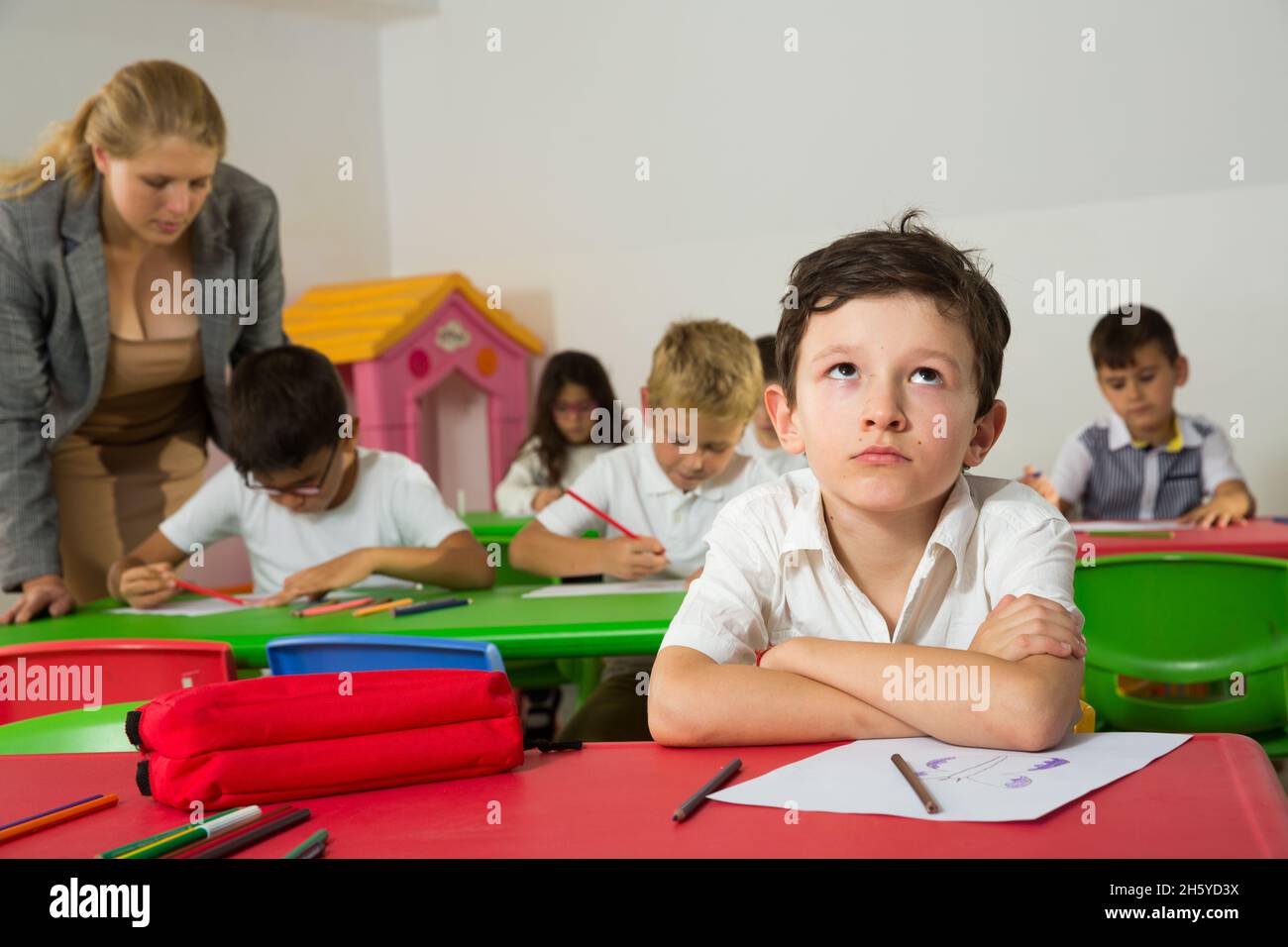 Upset child teacher hi-res stock photography and images - Alamy