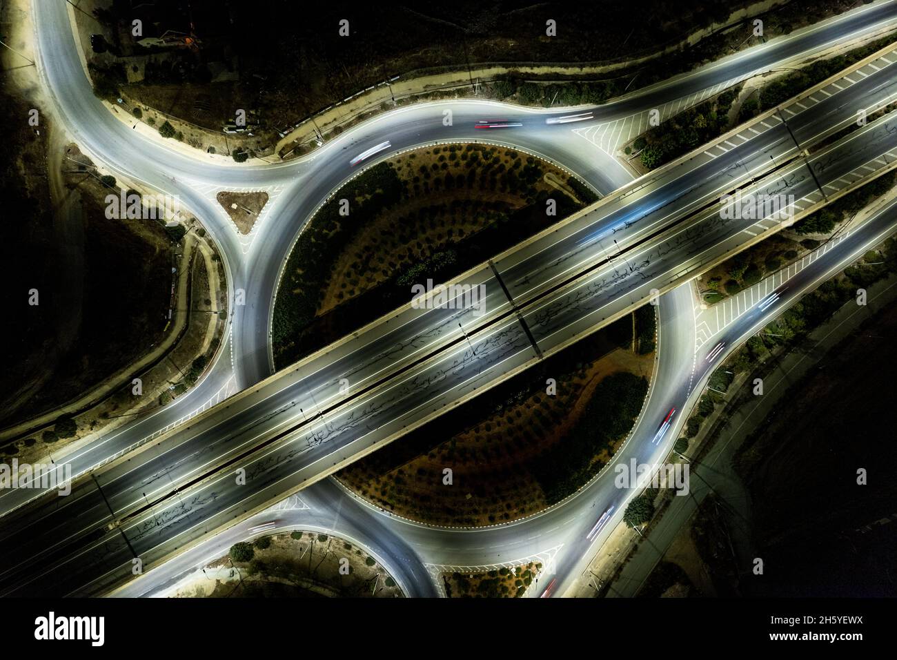 Aerial drone top view of a modern motorway junction roundabout with ...