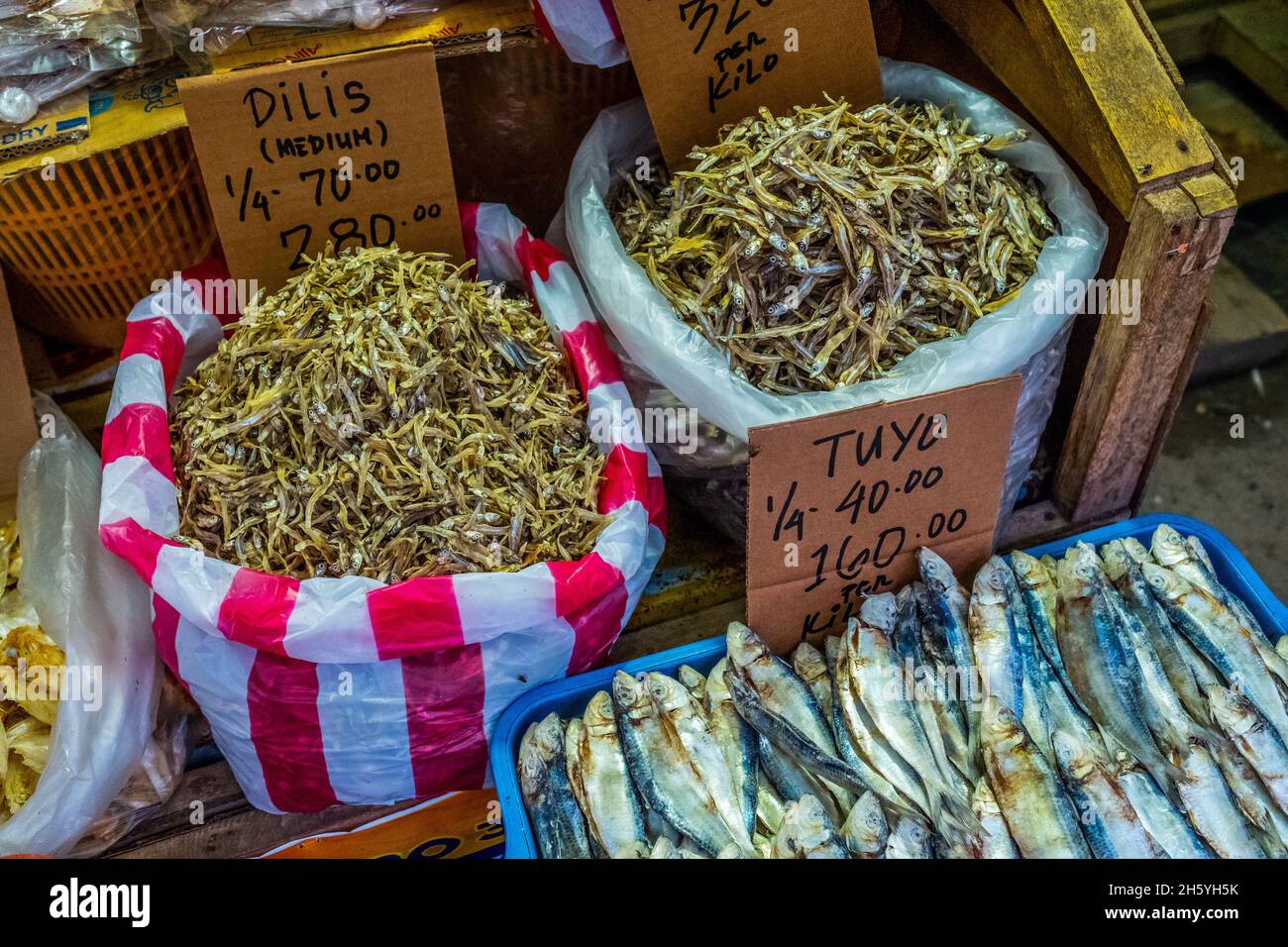 July 2017. A local market provides rice, fish, and other goods in ...
