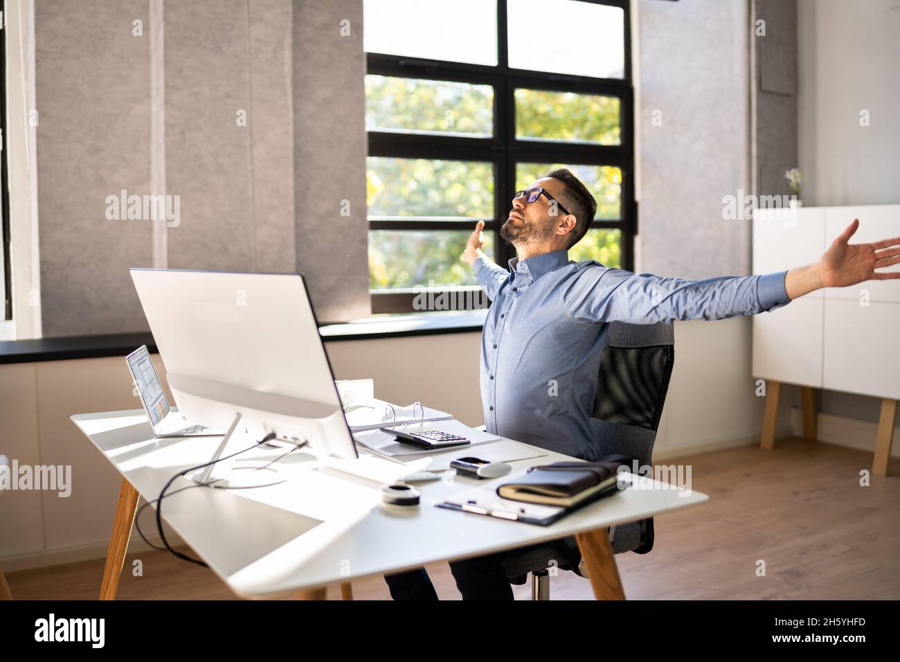 Stretch Exercise Workout At Office Business Desk Stock Photo - Alamy