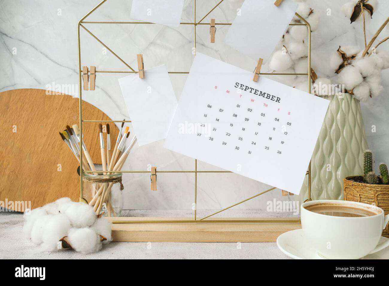 SEPTEMBER CALENDAR Cards and posters mock ups on grid board. Copy space ...