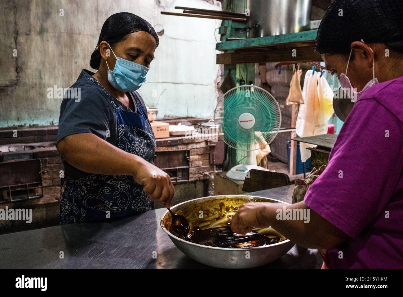 July 2017. Kitchen Staff prepare ginger tea powder. The Kalihan ...