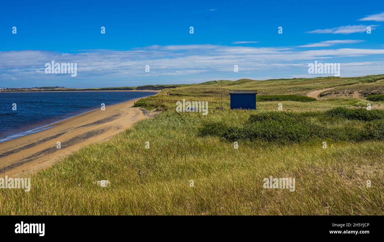 Dunes and meadows near the sandy beach of Aguanish, a small village ...