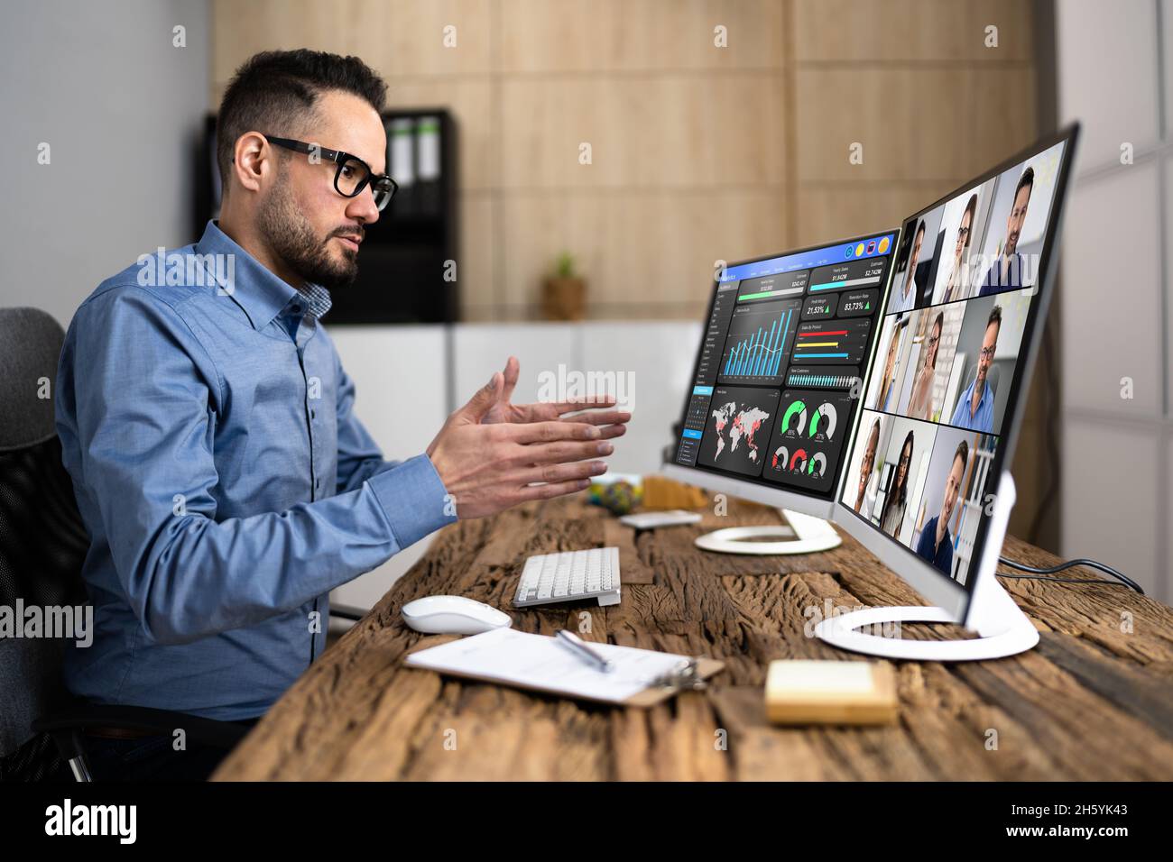 Man having video conference multiple hi-res stock photography and ...