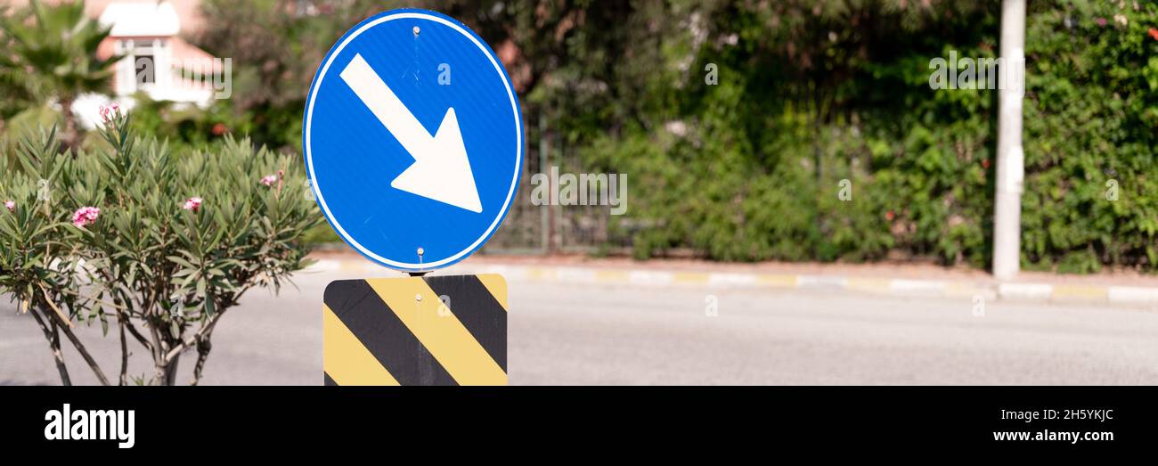 traffic safety signs on city street road. direction movement sign ...