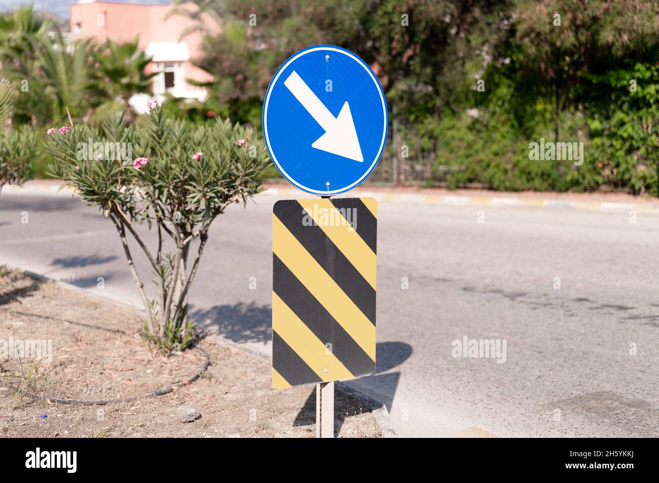 traffic safety signs on city street road. direction movement sign ...