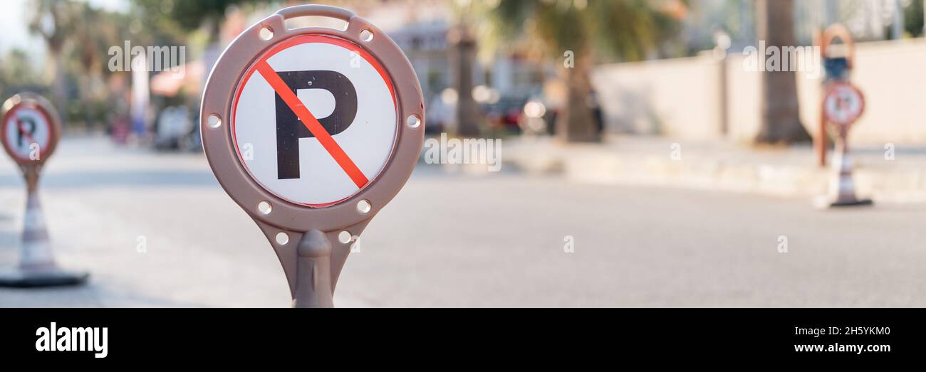 cone warning about a parking ban of automobile and cars. traffic safety ...