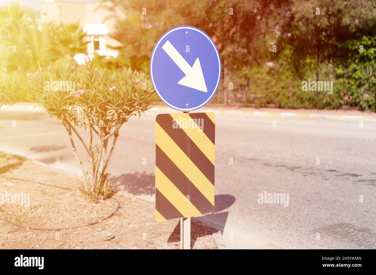 traffic safety signs on city street road. direction movement sign ...
