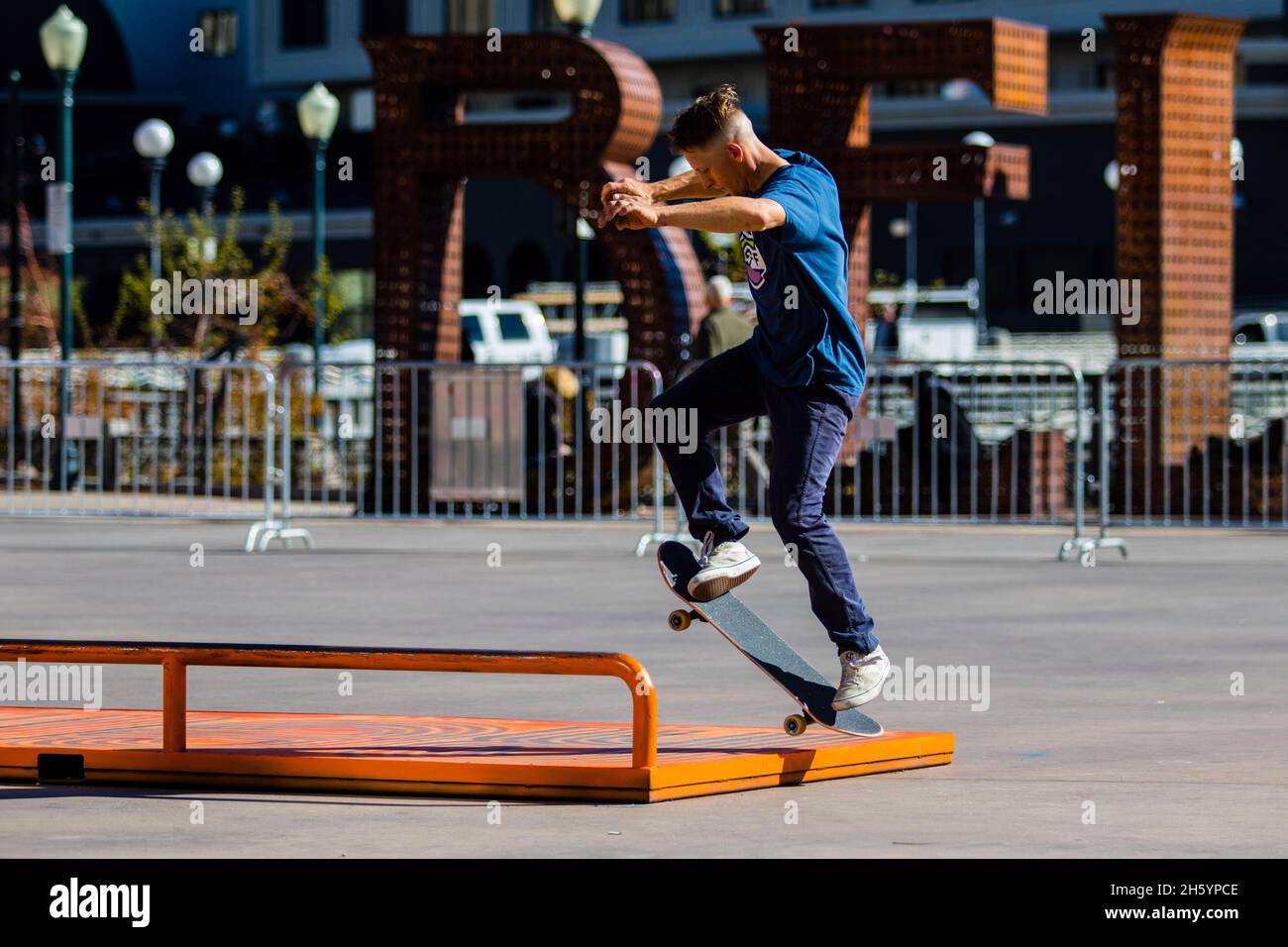 Reno, USA. 11th Nov, 2021. A skateboarder pulls a trick on a sunny day ...