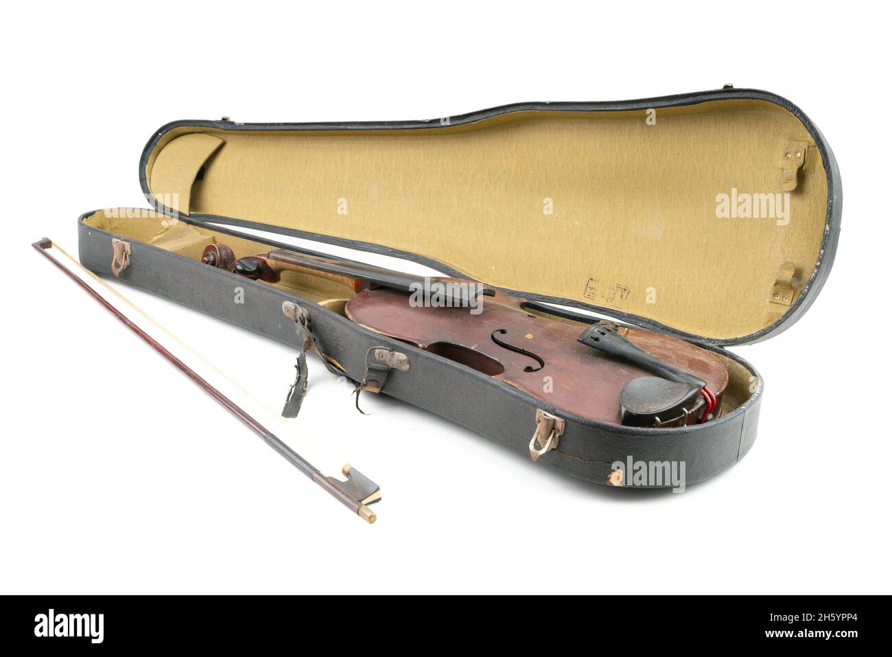 Wide closeup studio shot of old, broken, dust covered violin with its ...