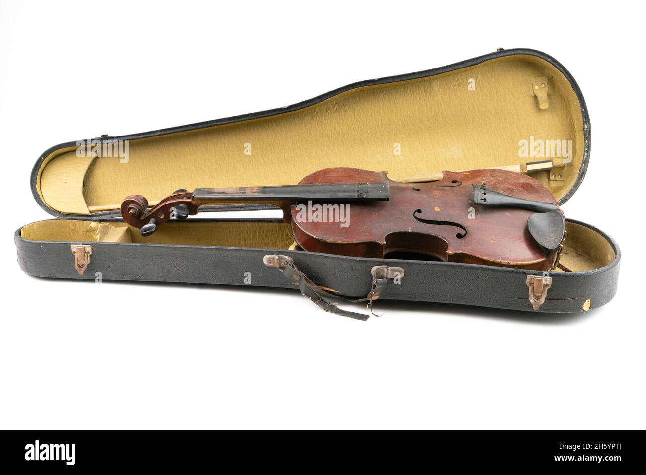 Wide closeup studio shot of old, broken, dust covered violin with its ...