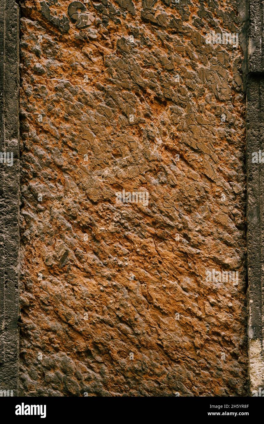 Orange texture of ancient stone in the wall Stock Photo - Alamy
