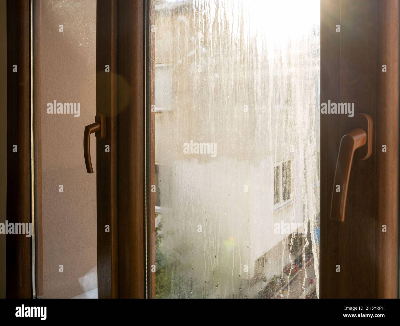 Close up photo of double glazed pvc window with condensation due to ...