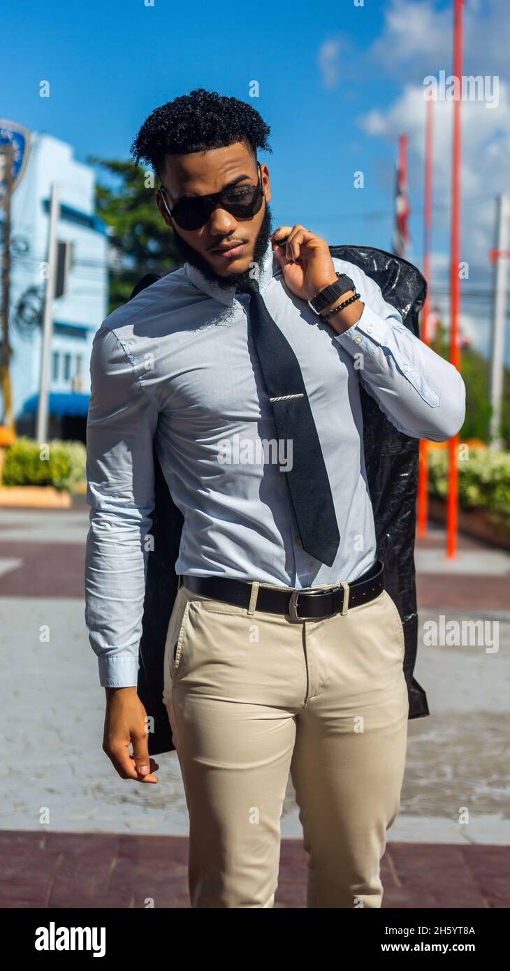 man leaves his job and goes for a walk in the park and enjoys his walk ...