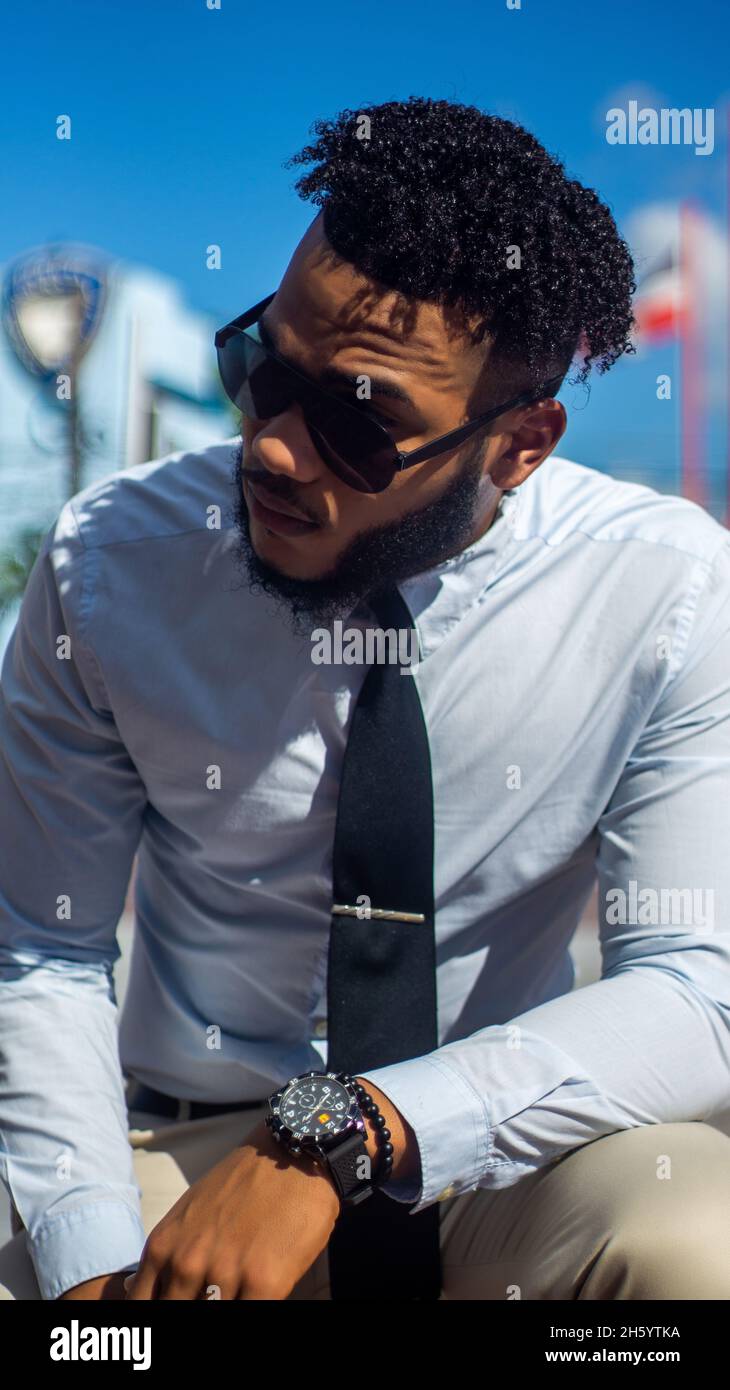 man leaves his job and goes for a walk in the park and enjoys his walk ...