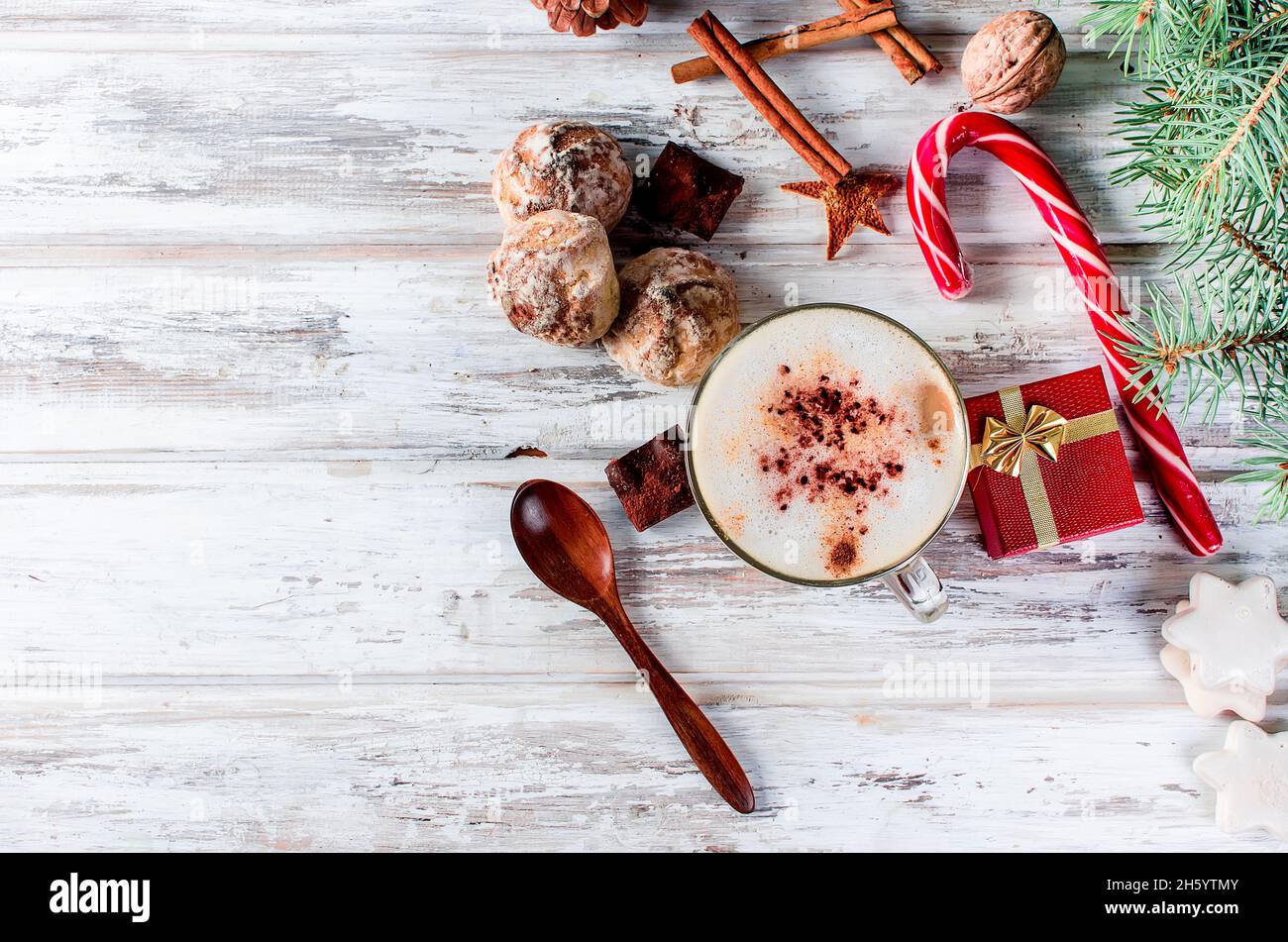 cup of hot cocoa or hot coffee latte with cinnamon, traditional ...