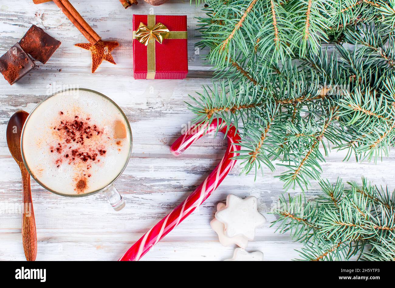 cup of hot cocoa or hot coffee latte with cinnamon, traditional ...