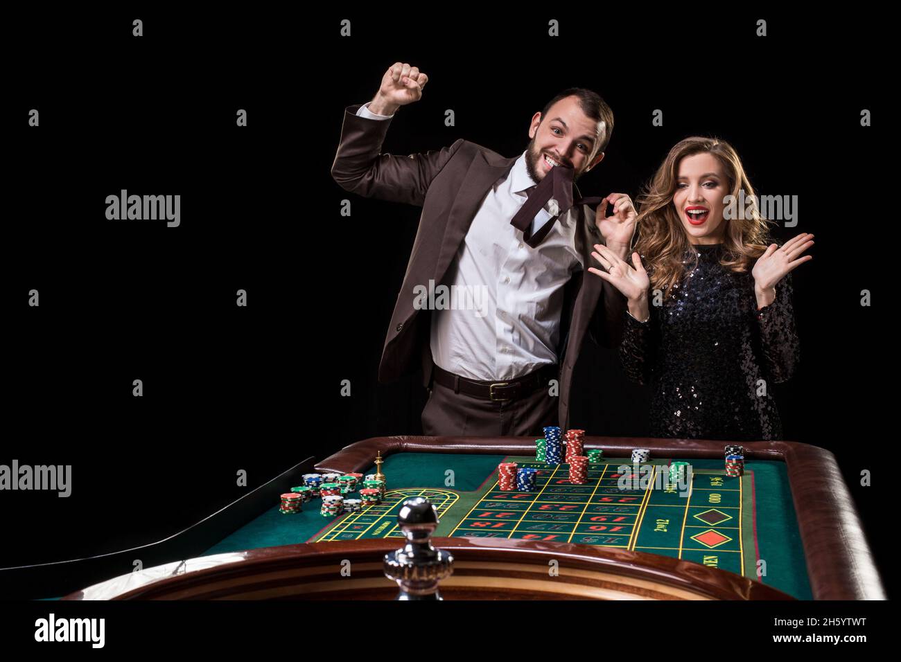 Smiling man celebrating roulette hi-res stock photography and images ...