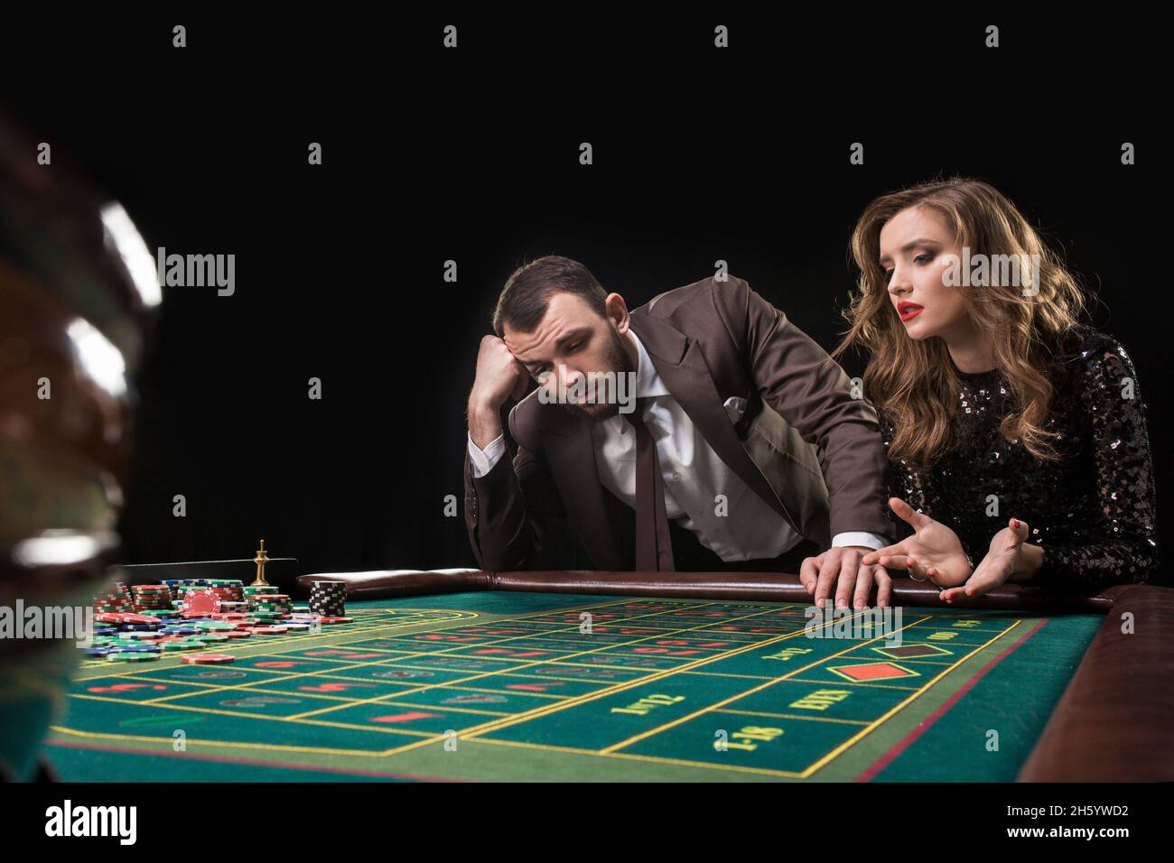 Smiling man celebrating roulette hi-res stock photography and images ...