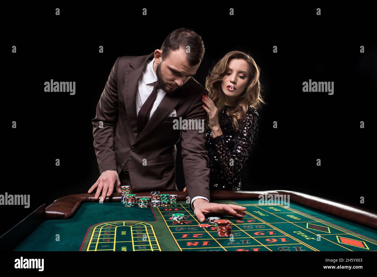 Smiling man celebrating roulette hi-res stock photography and images ...