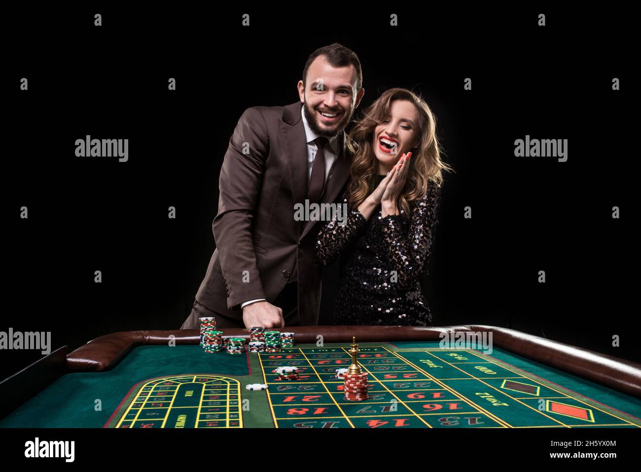 Smiling man celebrating roulette hi-res stock photography and images ...