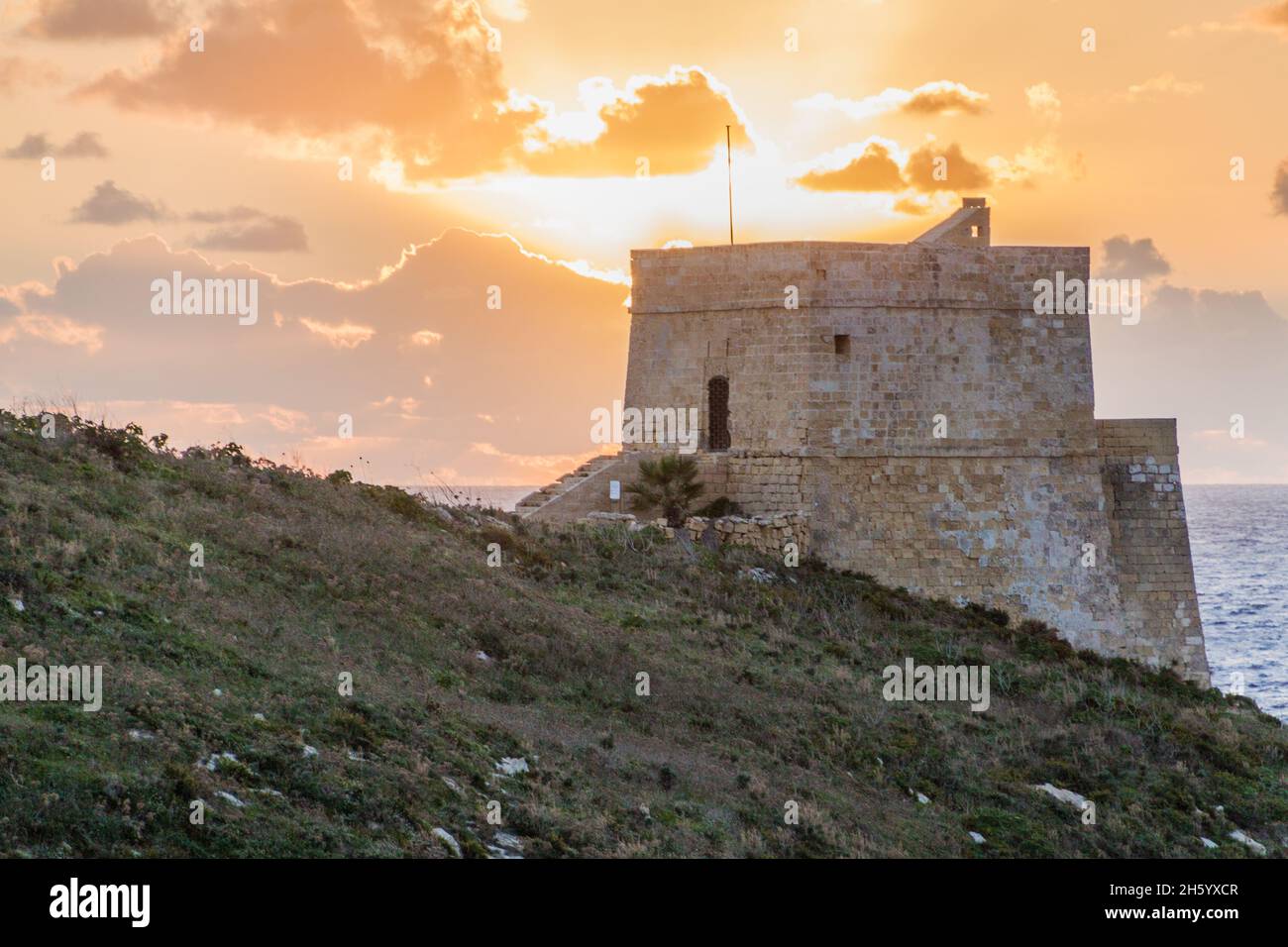 Sunset at the Xlendi Tower on the island of Gozo, Malta Stock Photo - Alamy