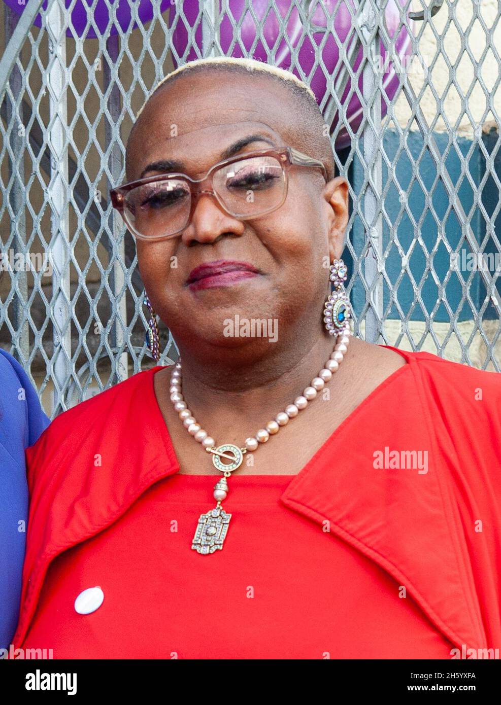 St. James Infirmary director Toni Newman stands at a ribbon cutting ...