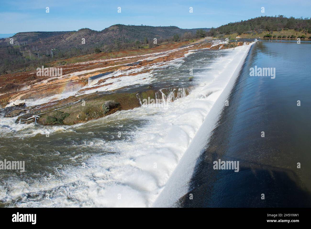 Water from the Oroville Dam Auxiliary Spillway at Lake Oroville ...