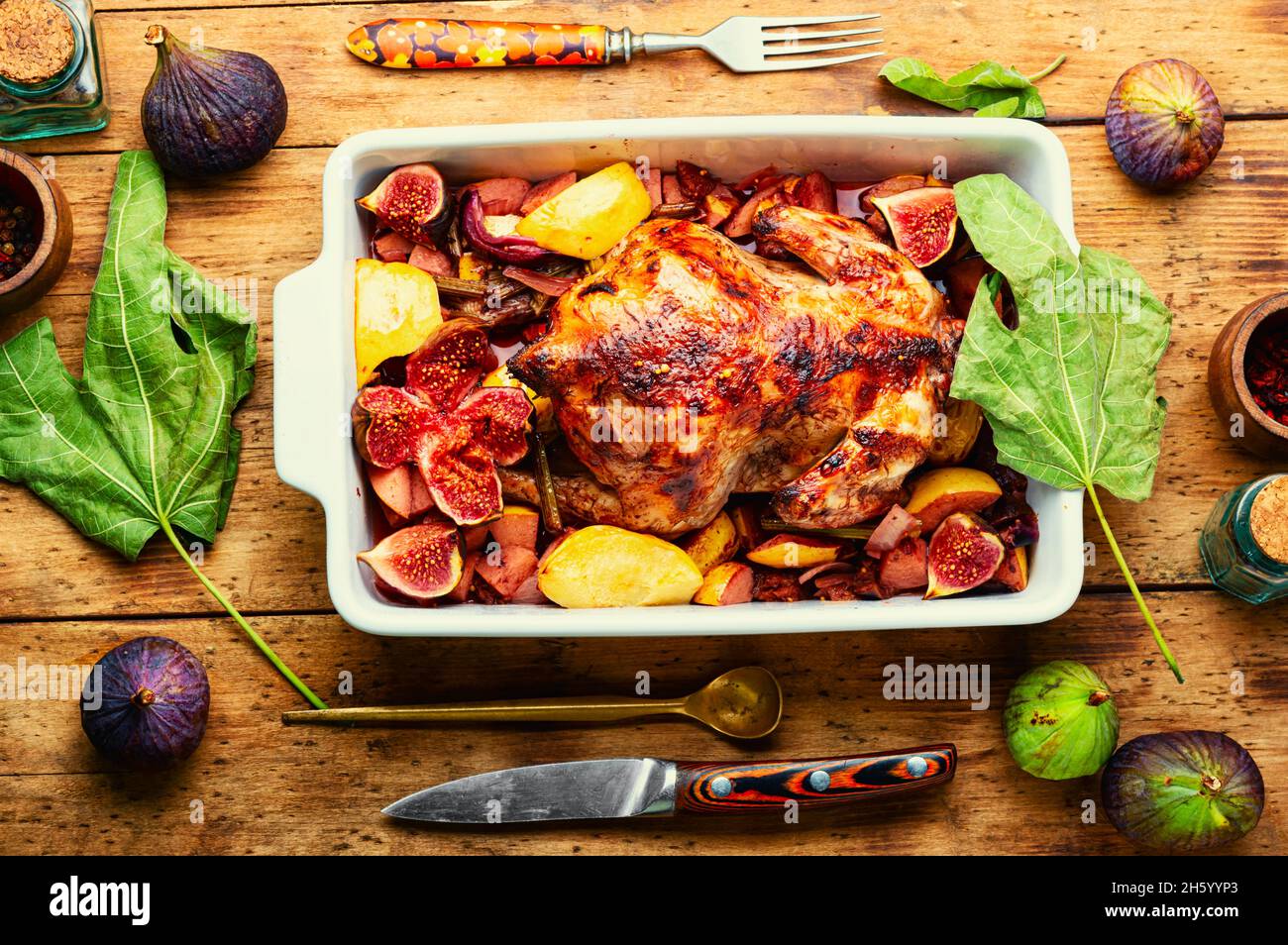 Homemade chicken baked with figs. Autumn recipe Stock Photo - Alamy